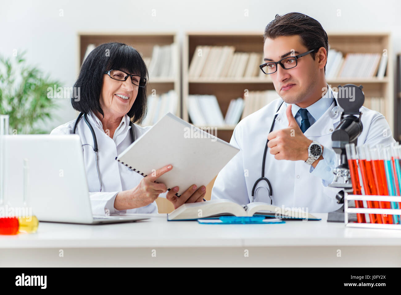 Two doctors working in the lab Stock Photo - Alamy
