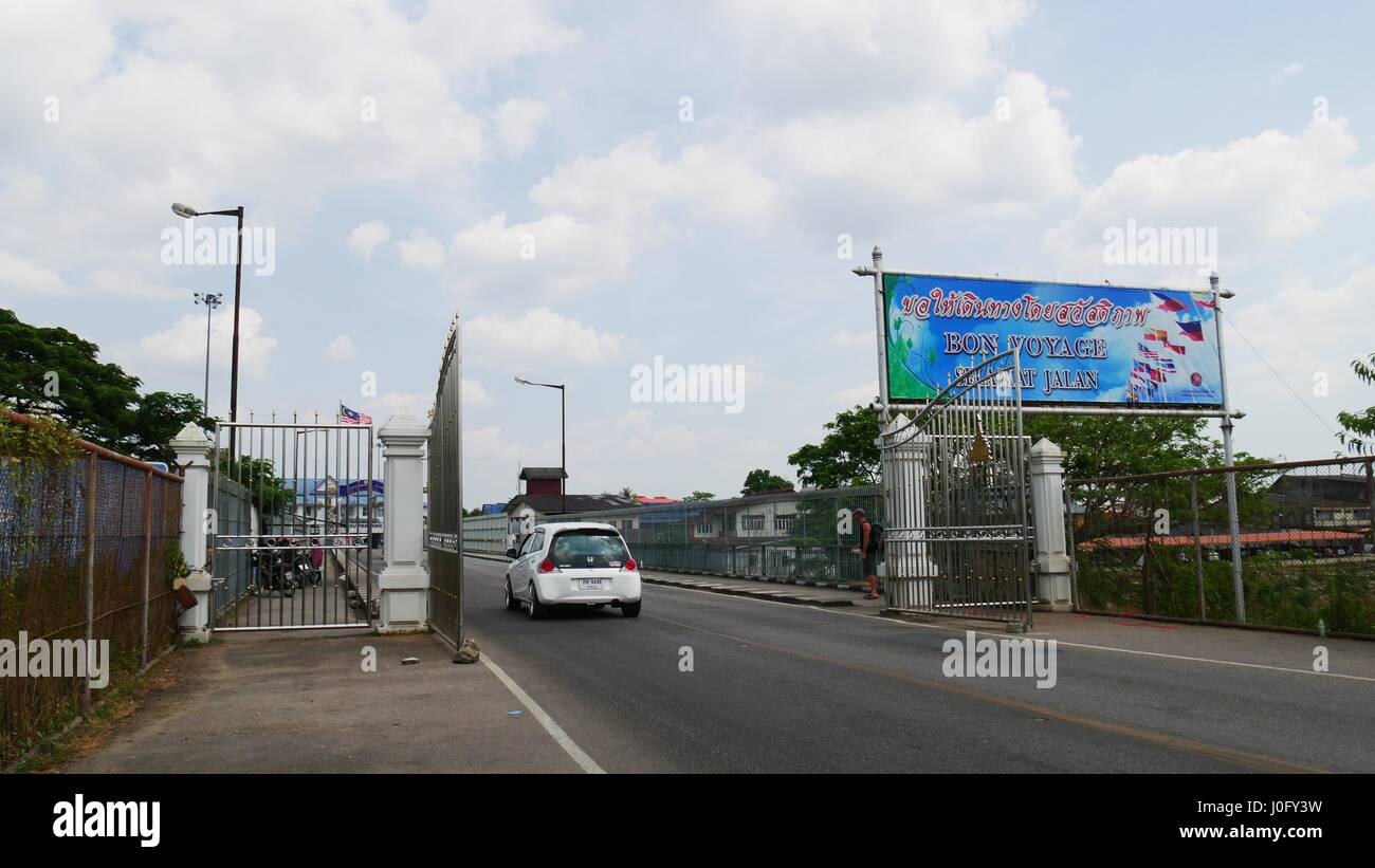 Sungai Gulok, Thailand--August 2016: The white fence is the border of ...