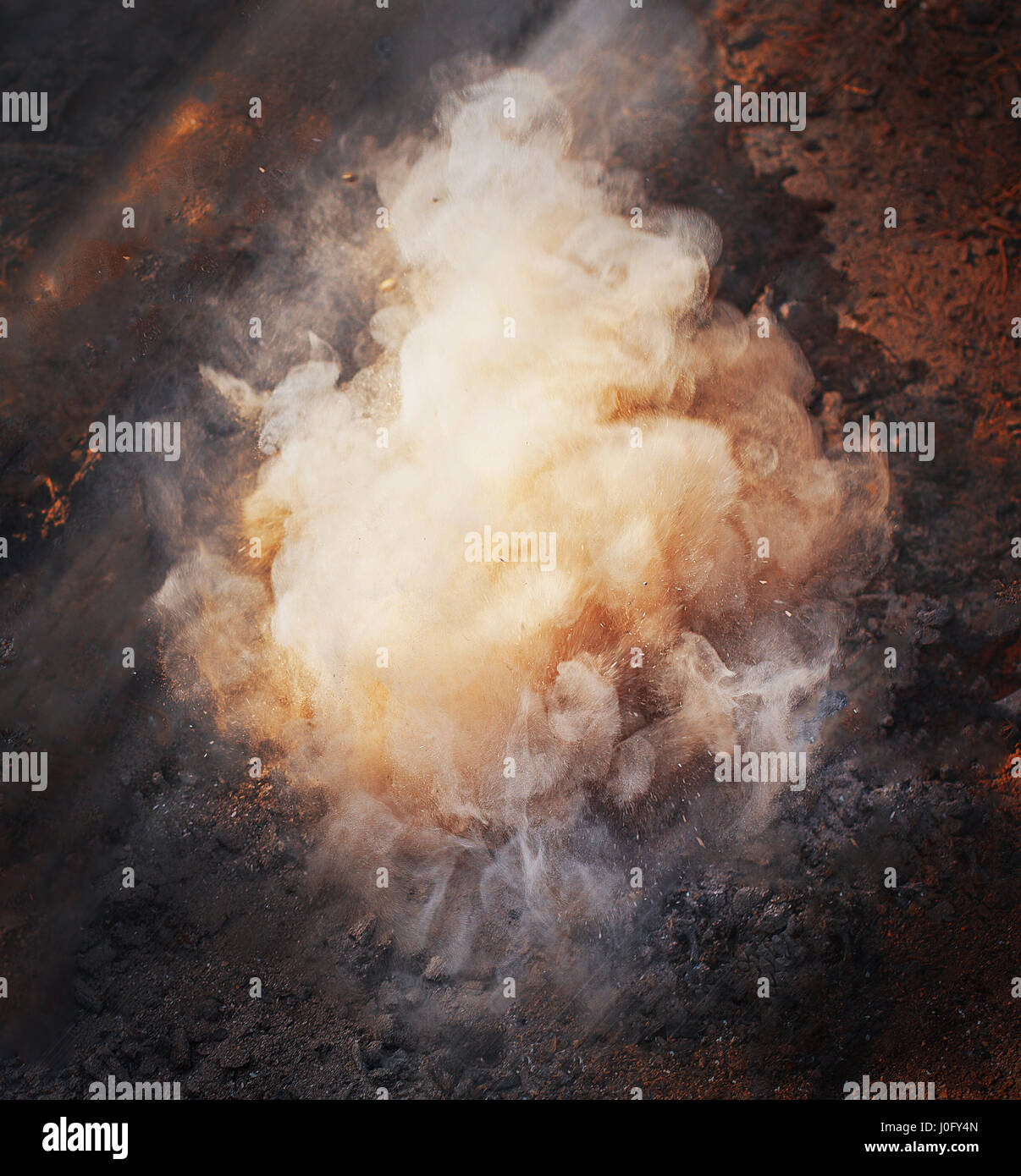 Smoke from fire on the ground Stock Photo - Alamy