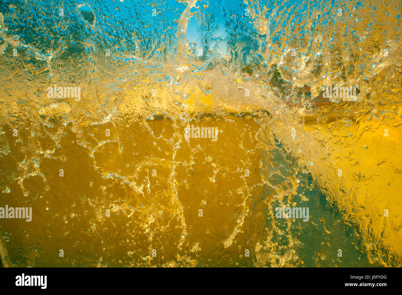 Yellow and blue: water, oil Stock Photo - Alamy