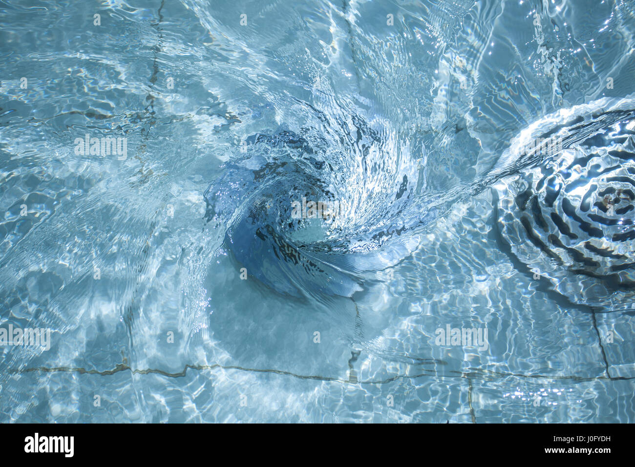 Water is drained, the funnel Stock Photo - Alamy