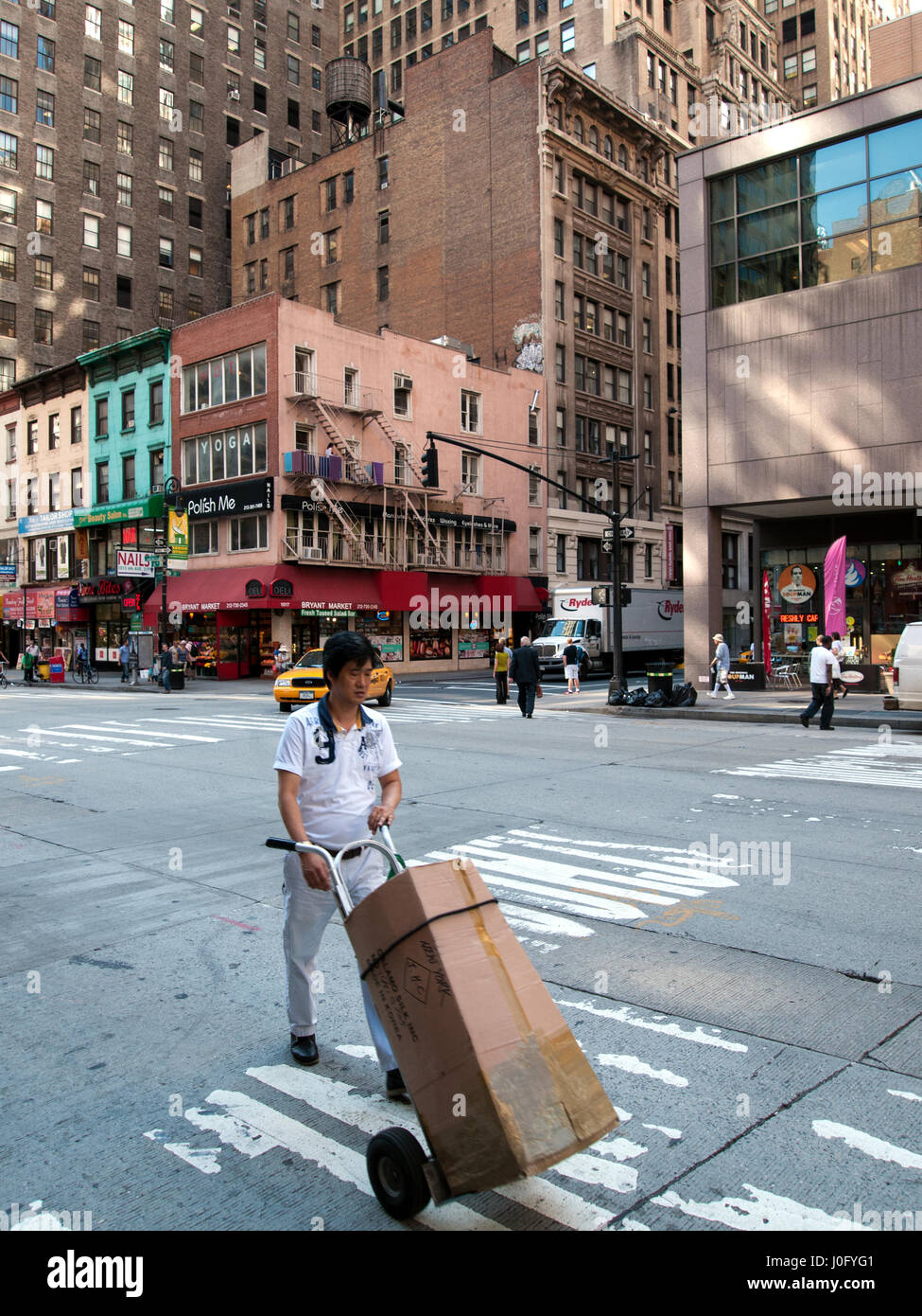 Man delivering a packet in Manhattan Stock Photo - Alamy