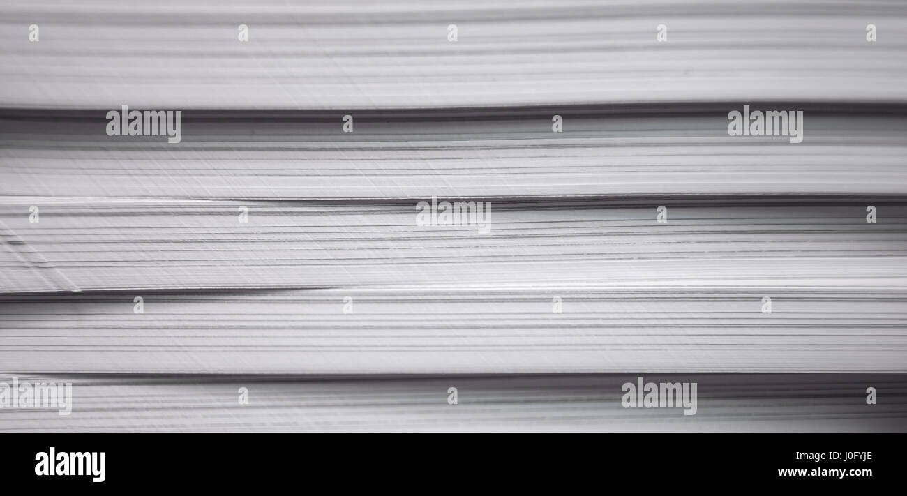 Stack of pages of magazines Stock Photo - Alamy