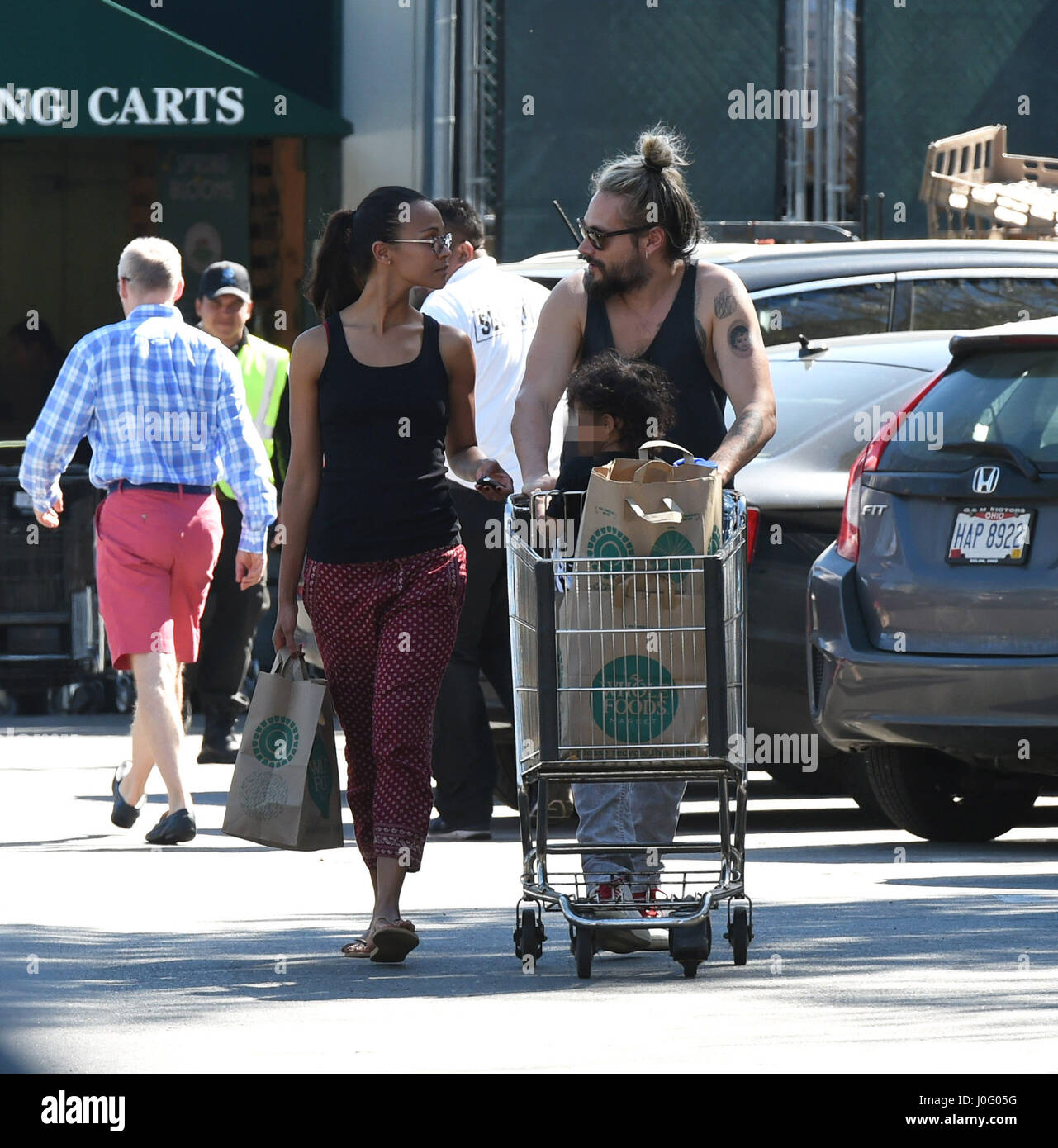 Zoe Saldana with her husband Marco Perego-Saldana and their son grocery ...