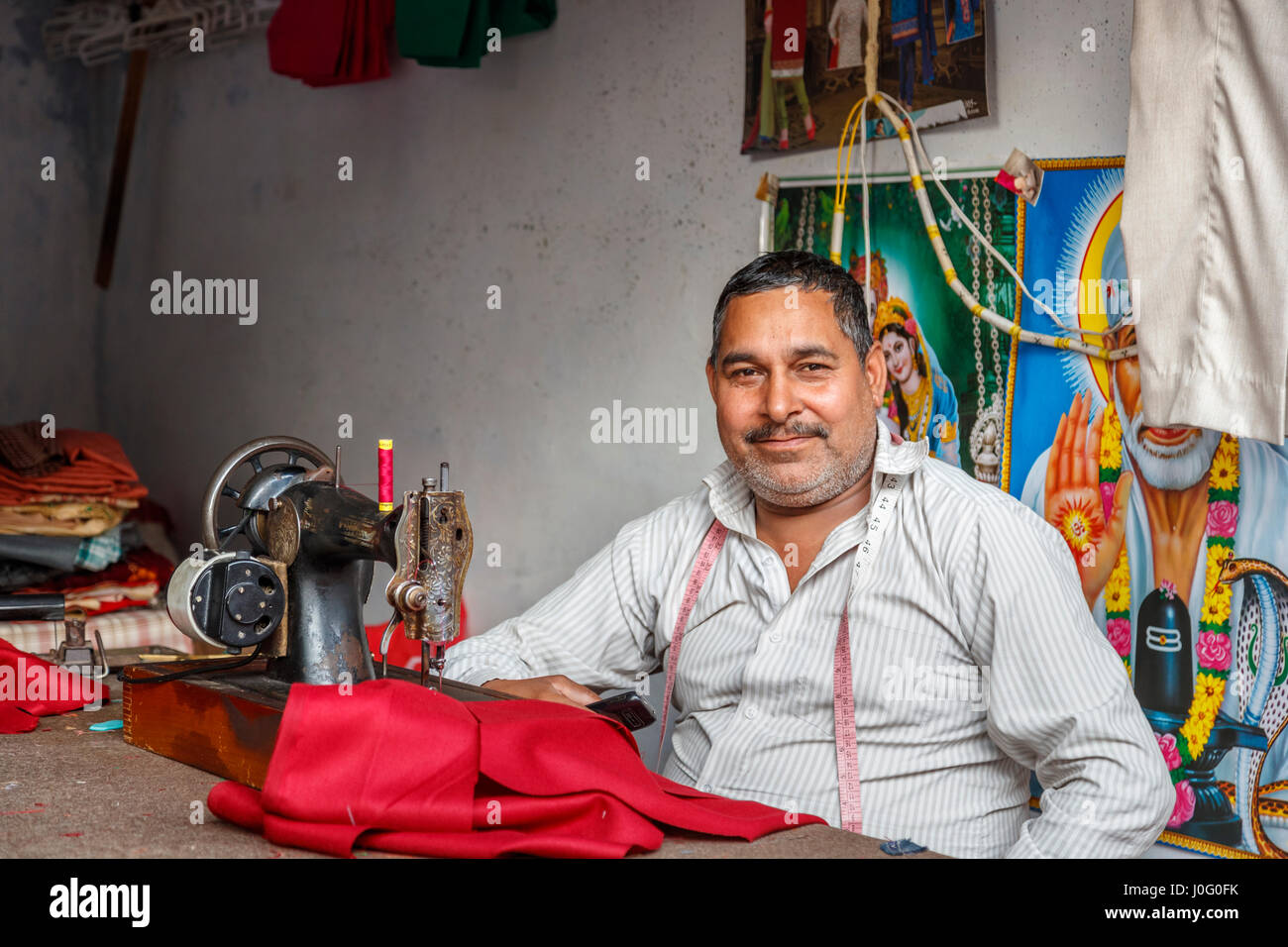 Indian shopkeeper smiling hi-res stock photography and images - Alamy