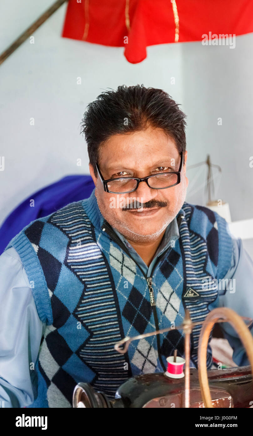Indian shopkeeper smiling hi-res stock photography and images - Alamy