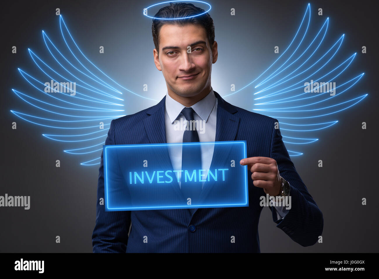 Angel investor concept with businessman with wings Stock Photo - Alamy