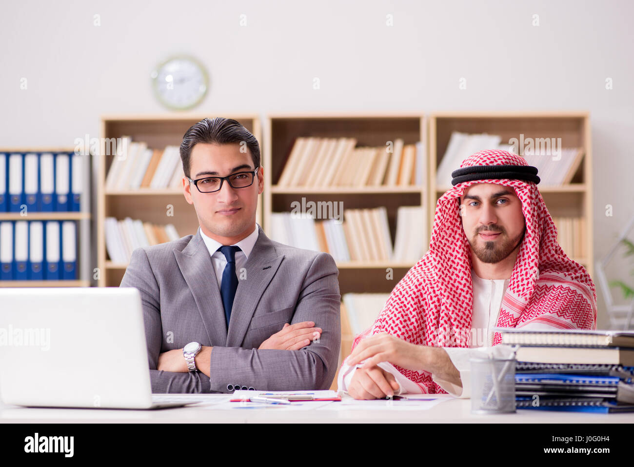 Diverse business concept with arab businessman Stock Photo - Alamy