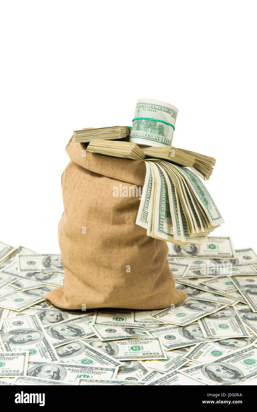 Money in the bag isolated on a white background Stock Photo - Alamy