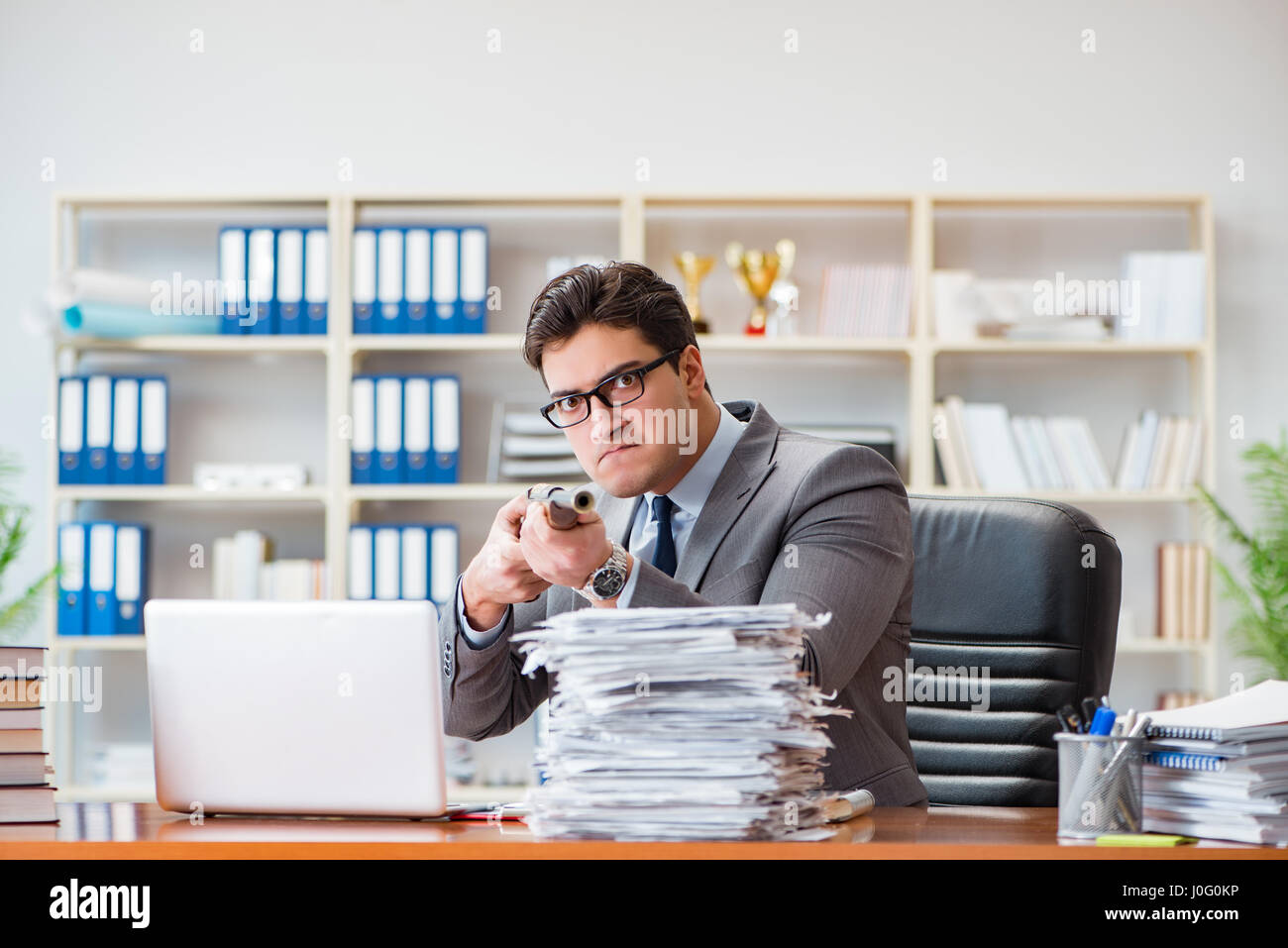 Angry aggressive businessman in the office Stock Photo - Alamy