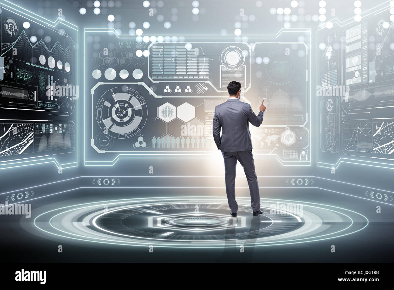 Man pressing virtual button in data mining concept Stock Photo - Alamy