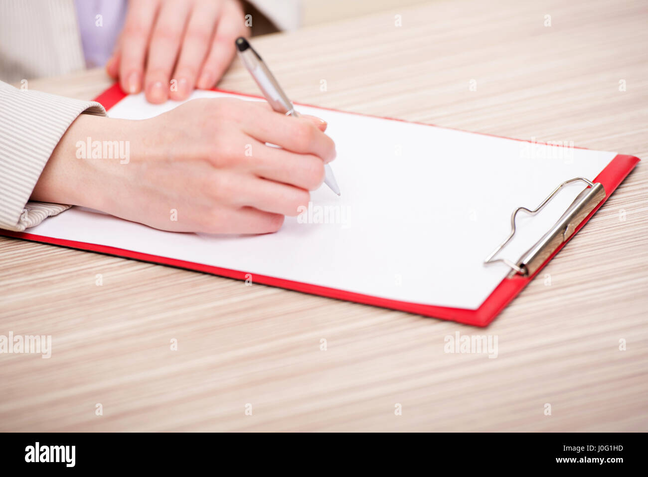 Hands taking notes in the pad Stock Photo - Alamy