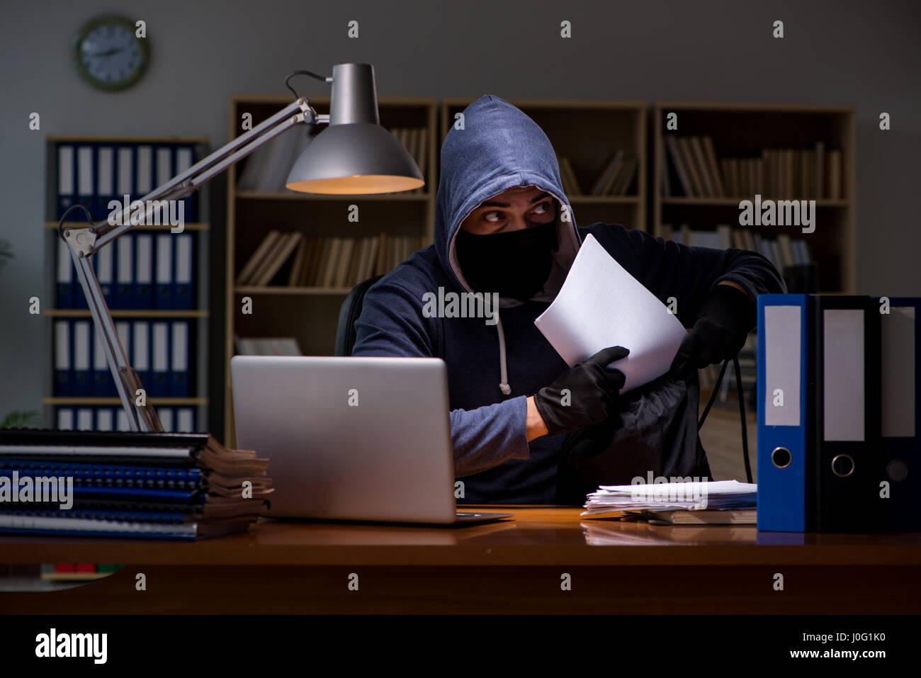 Hacker stealing personal data from home computer Stock Photo - Alamy