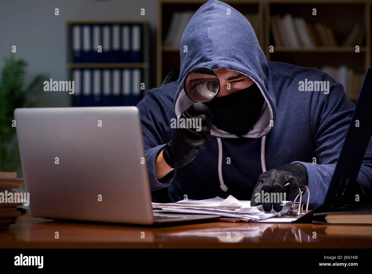 Hacker stealing personal data from home computer Stock Photo - Alamy