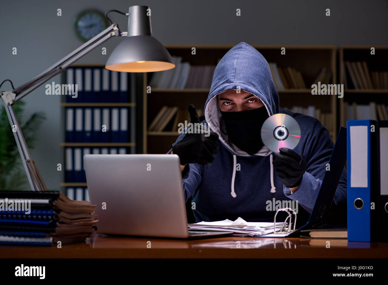 Hacker stealing personal data from home computer Stock Photo - Alamy