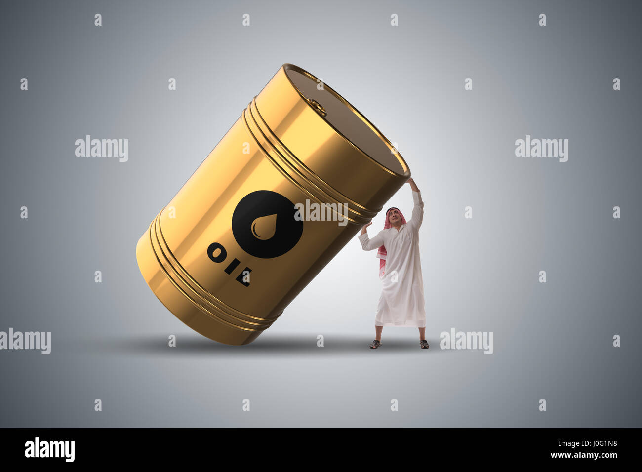 Arab businessman holding oil barrel Stock Photo - Alamy