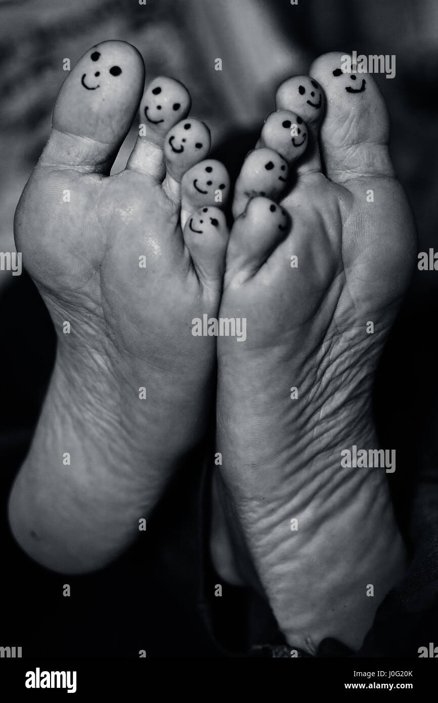 Ten toes feet smiley faces hi-res stock photography and images - Alamy