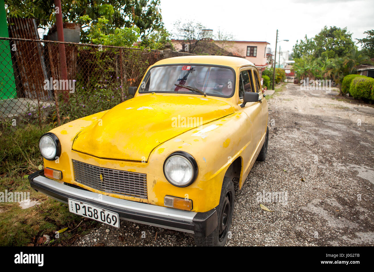 Yellow car, Havana, Cuba Stock Photo - Alamy