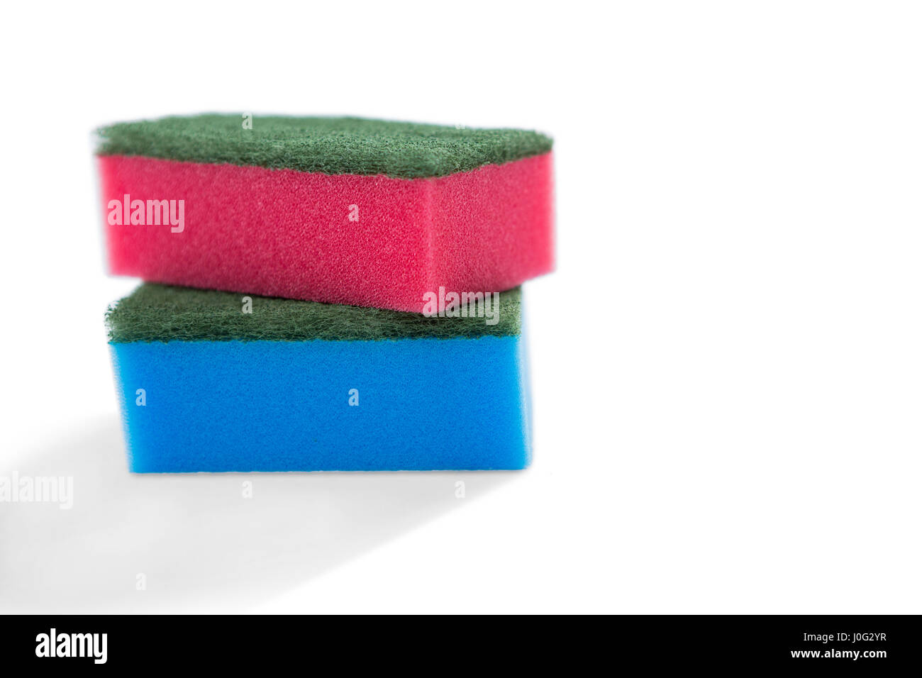 Close-up of multi colored sponge against white background Stock Photo ...
