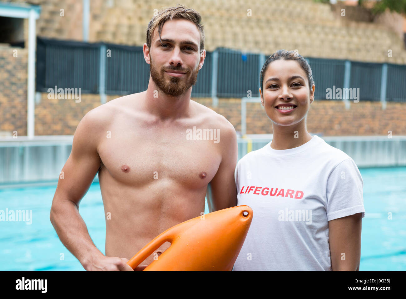 Smiling lifeguards hi-res stock photography and images - Alamy