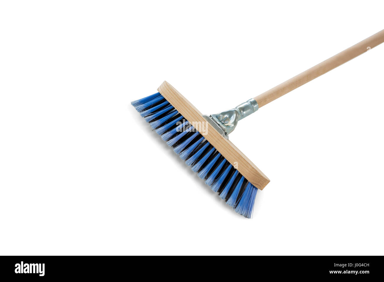 Cropped image of broom against white baclground Stock Photo - Alamy