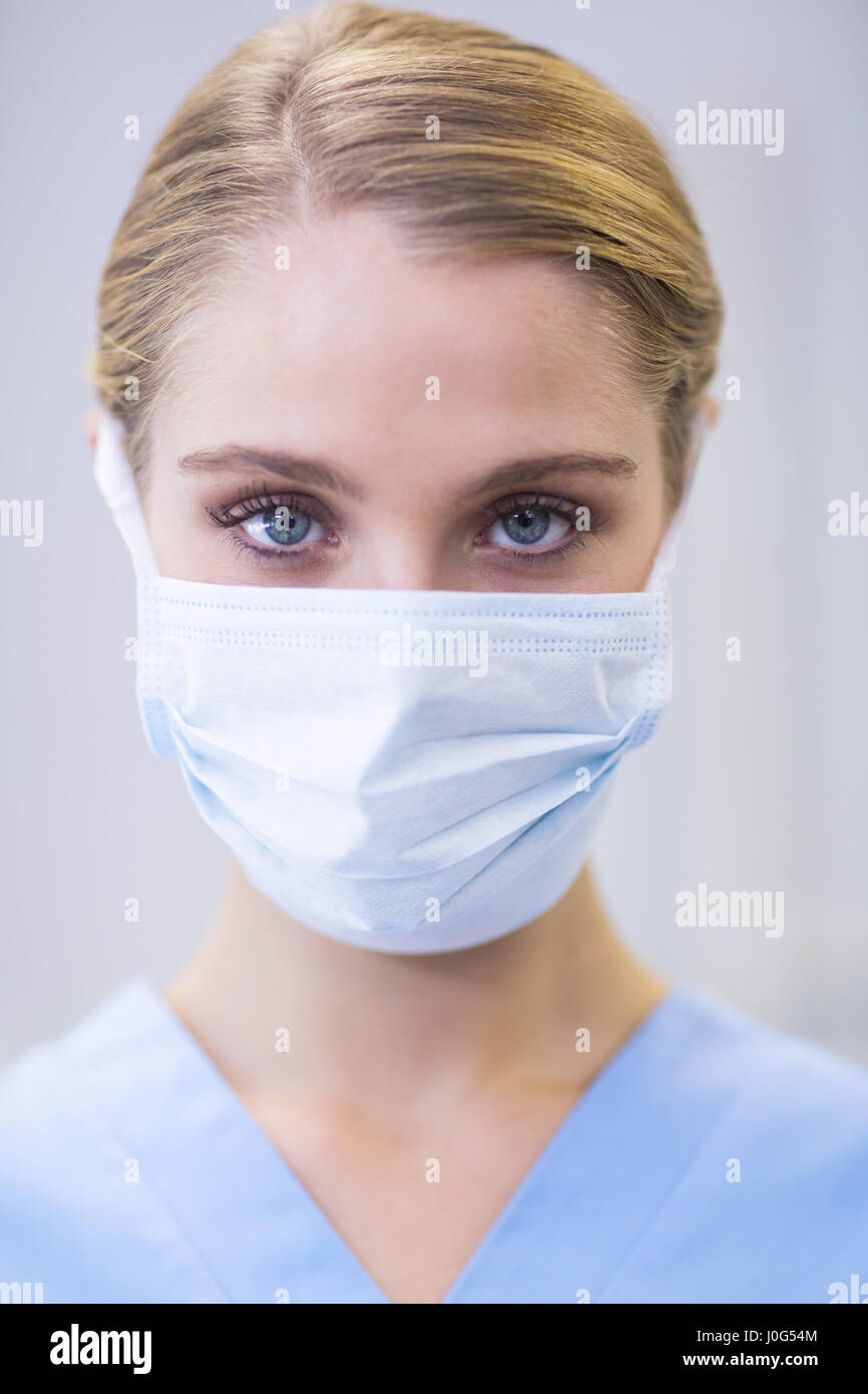 Young pretty nurse in mask hi-res stock photography and images - Alamy