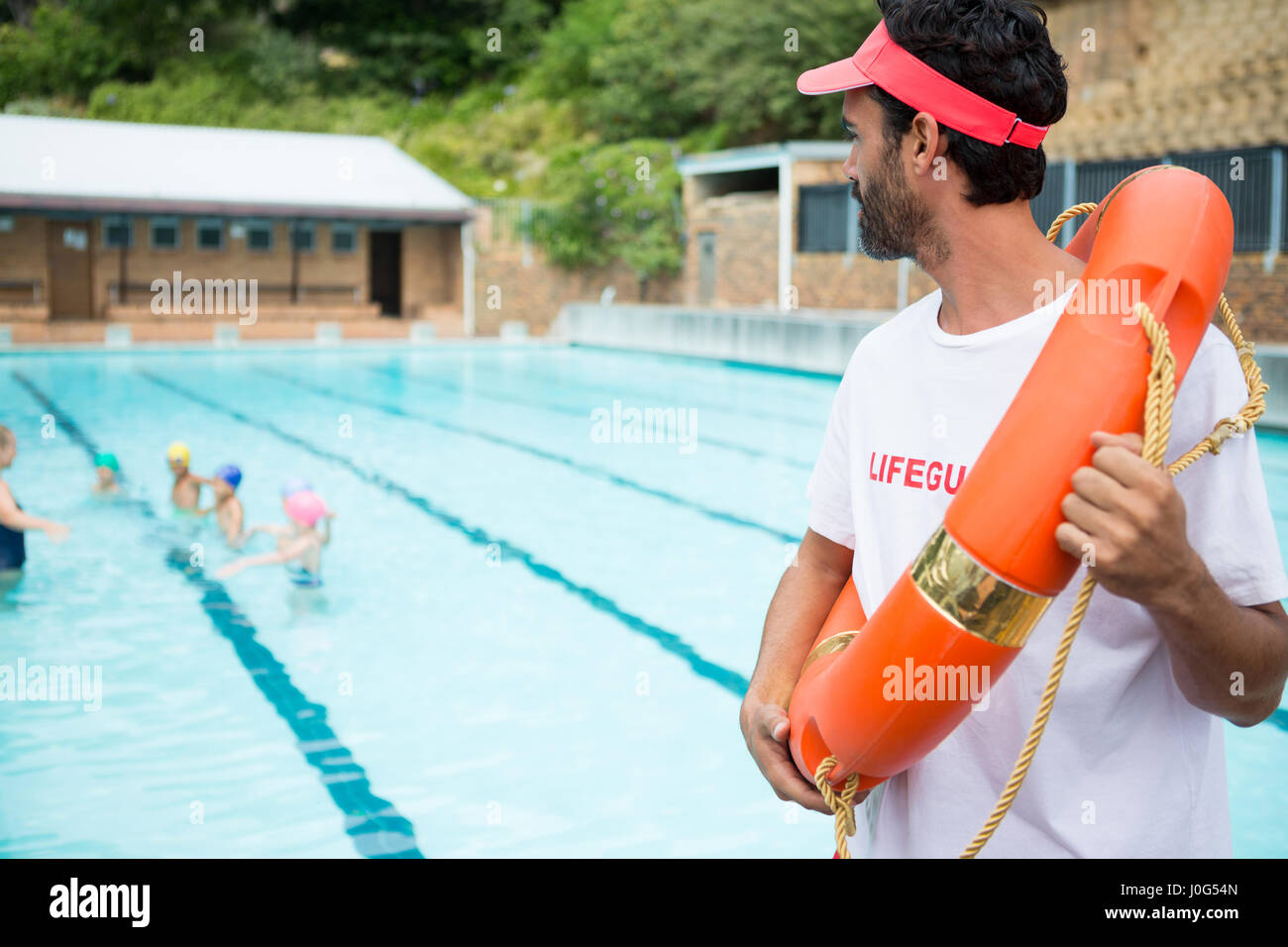 Male pool lifeguard hi-res stock photography and images - Alamy