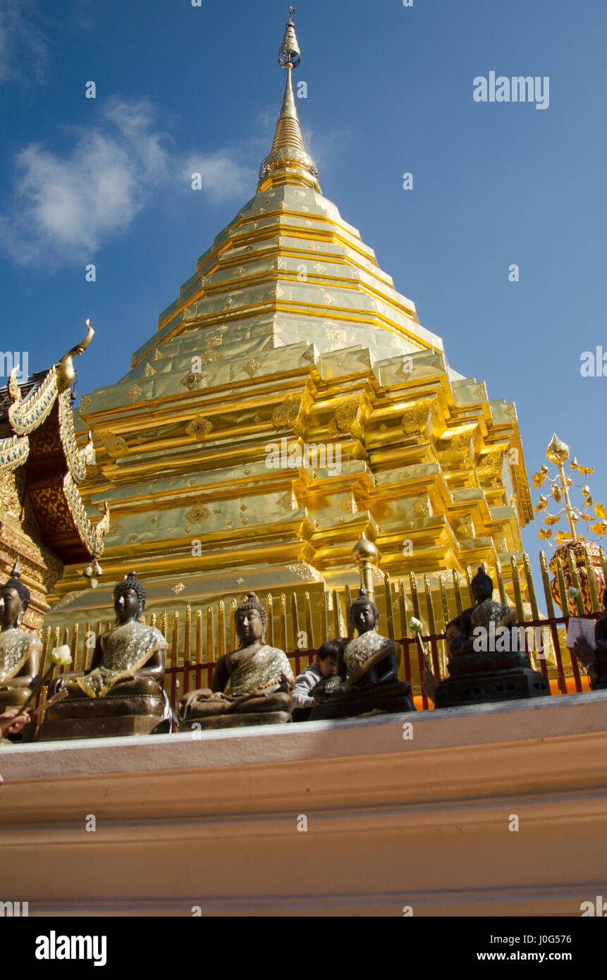 Golden chedi for thai people and foreigner respect pray and posing for ...