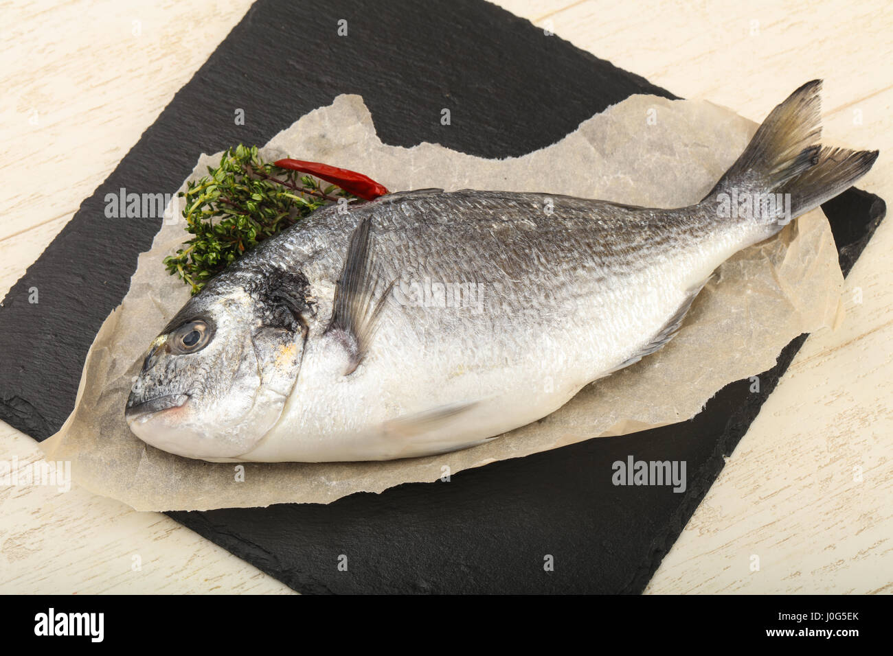 raw dorada fish - ready for cooking Stock Photo - Alamy