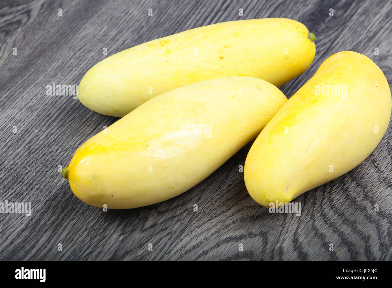 Fresh ripe sweet Yellow mango on wood background Stock Photo - Alamy