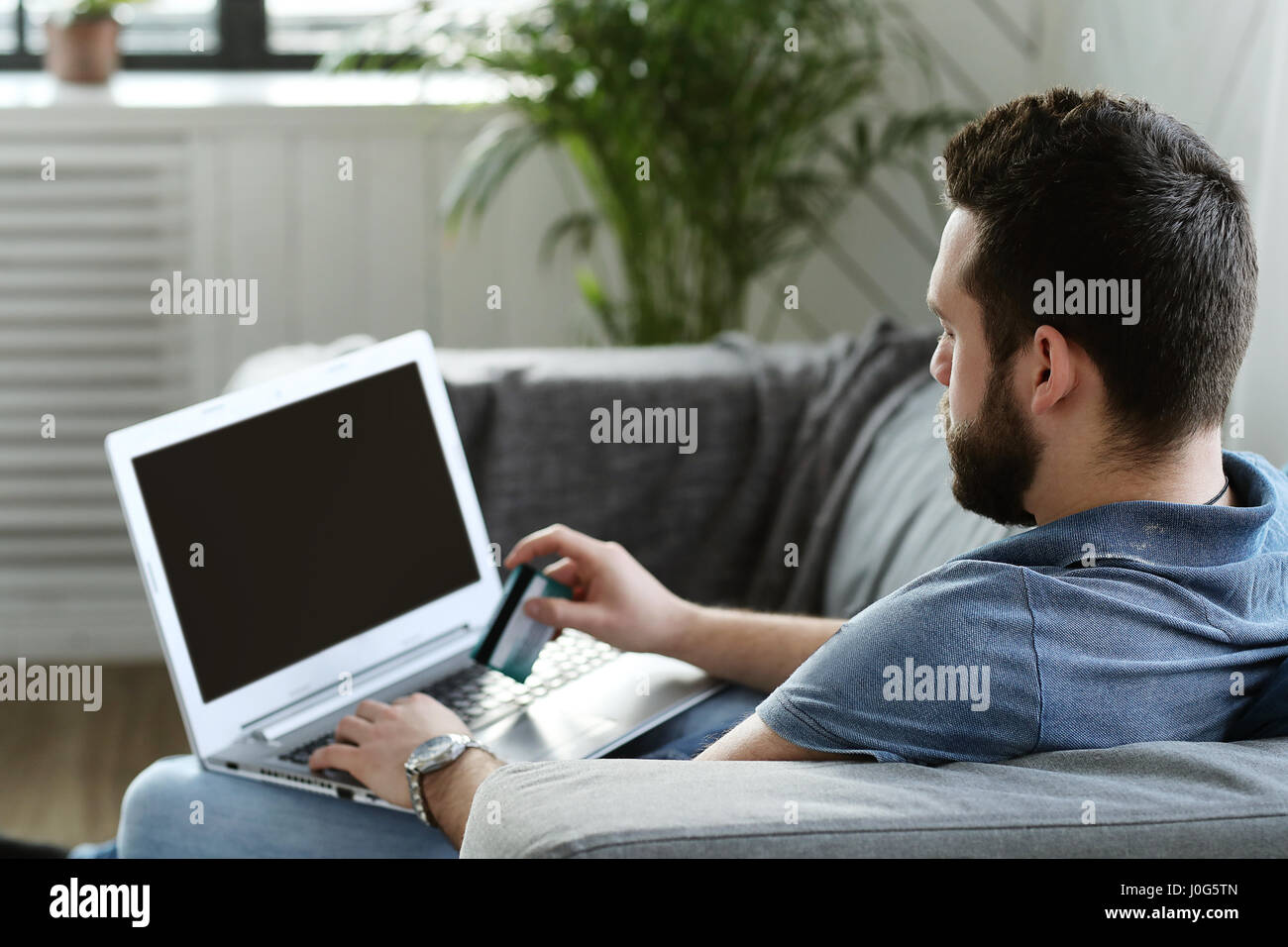 Lifestyle. Handsome man with laptop Stock Photo - Alamy