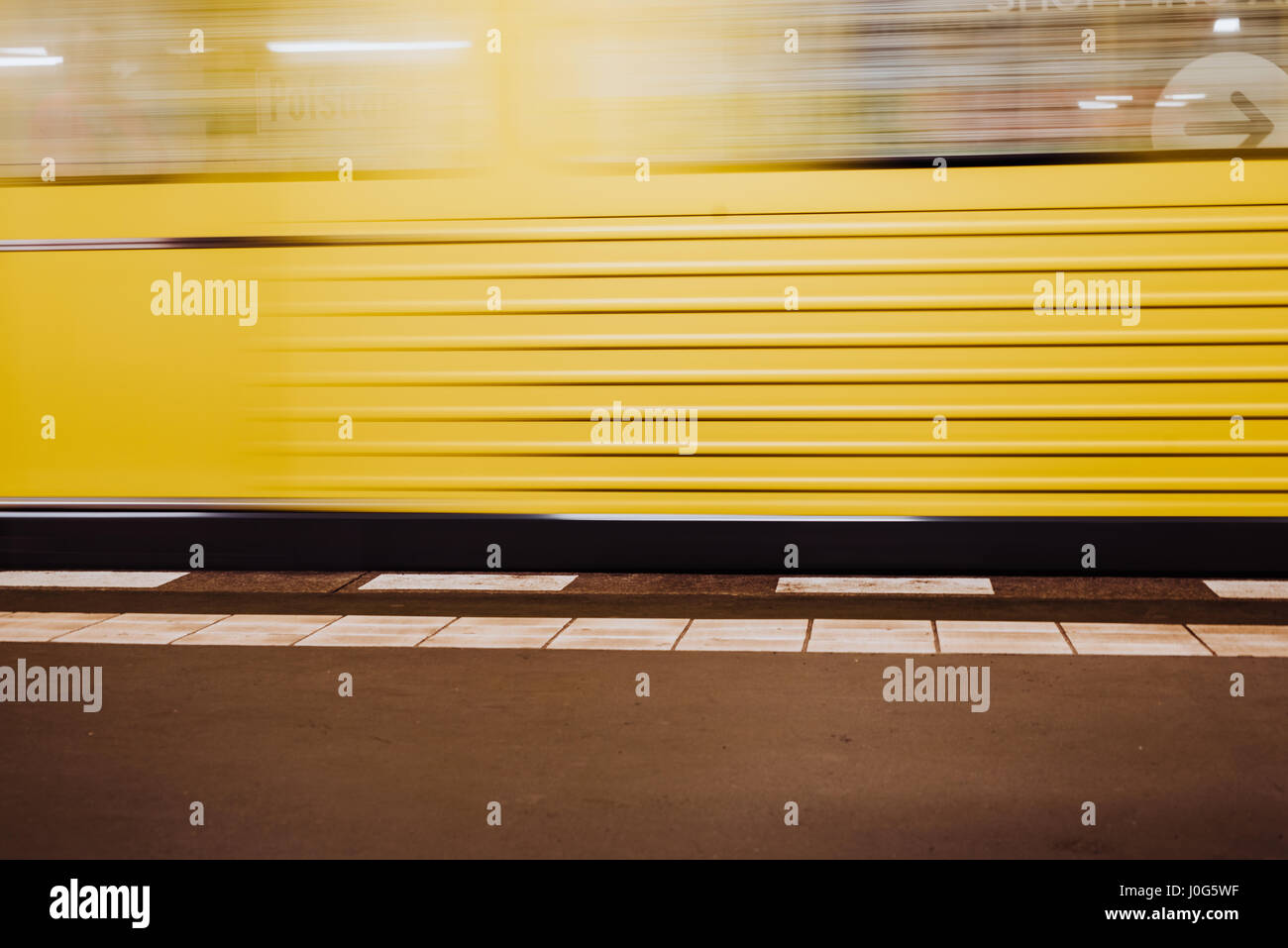 Fast yellow subway train in motion Stock Photo - Alamy