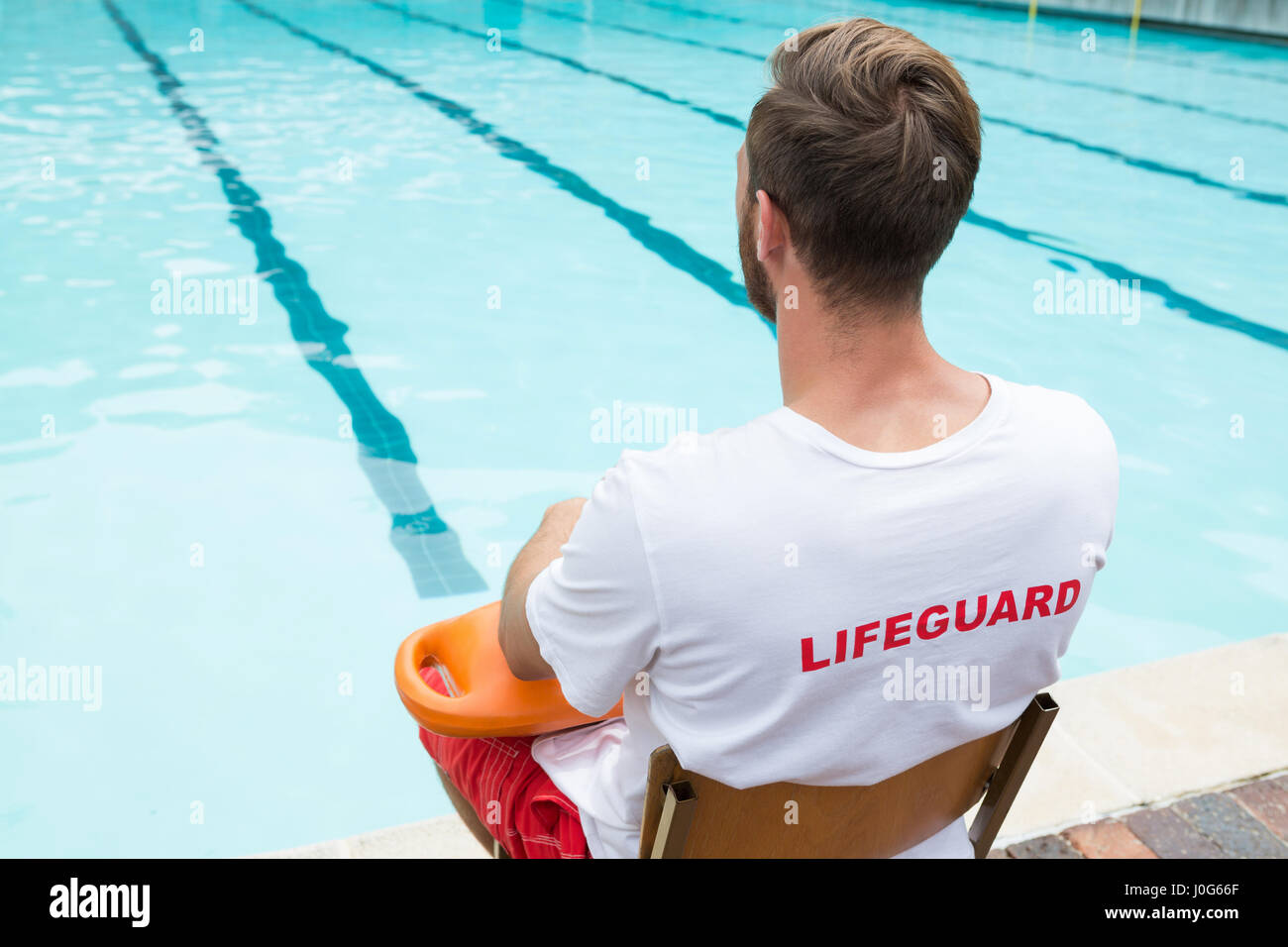 Pool lifeguard chair hi-res stock photography and images - Alamy