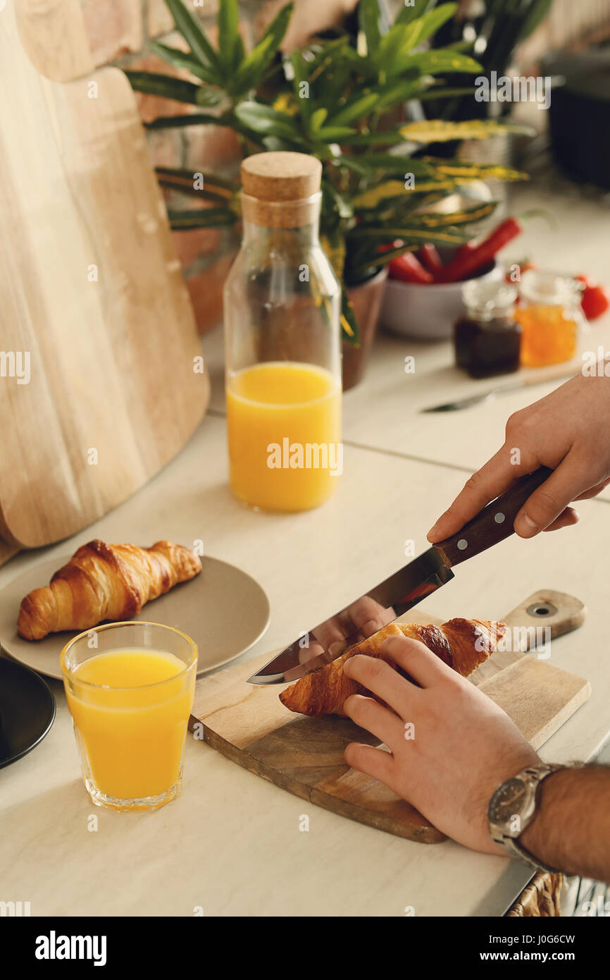 Cooking. Man cooks at kitchen Stock Photo - Alamy