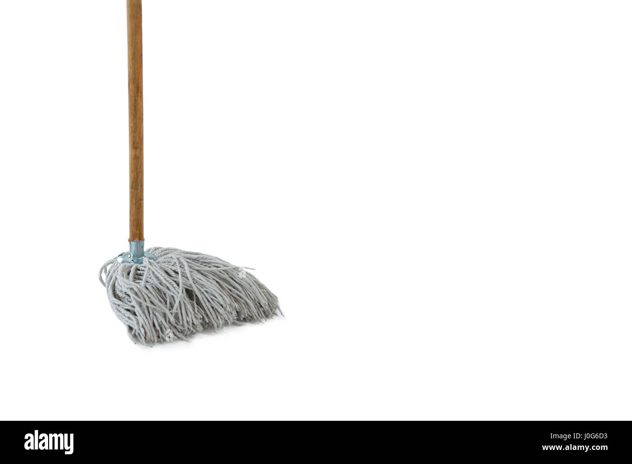 Close-up of mop against white background Stock Photo - Alamy