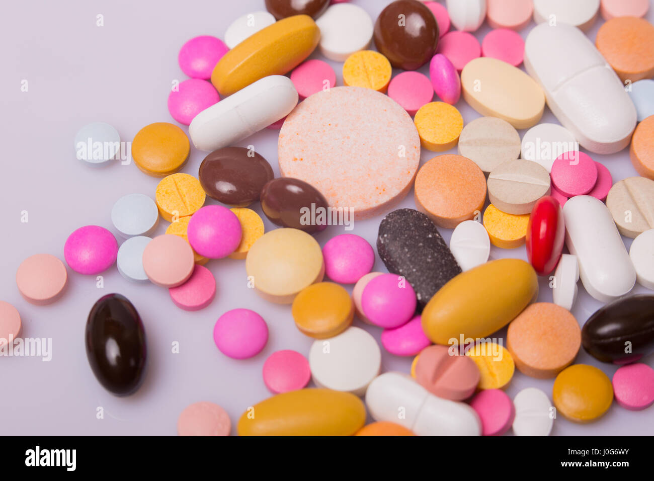 different Tablets pills capsule heap mix therapy drugs Stock Photo - Alamy
