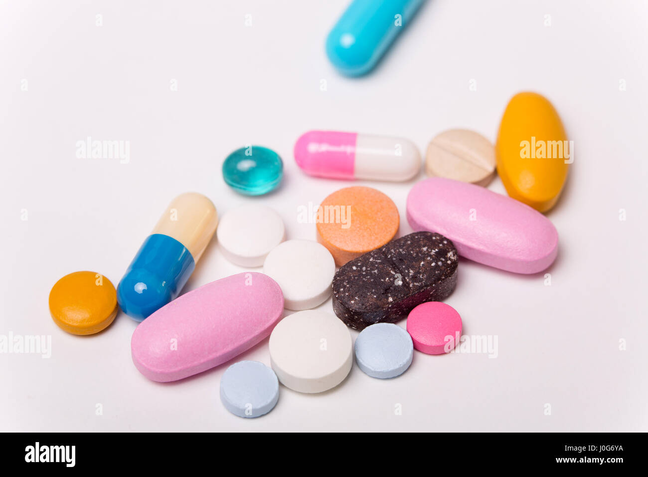 different Tablets pills capsule heap mix therapy drugs Stock Photo - Alamy