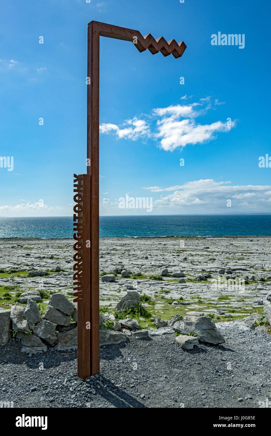 Limestone pavement and Wild Atlantic Way sign at Murrooghtoohy, The ...