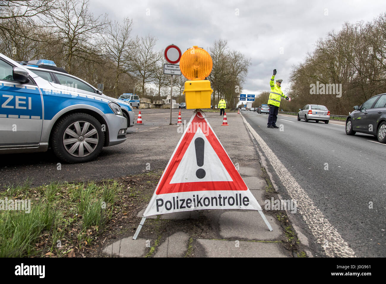 Police control of trucks, on the Autobahn A555 in Cologne, Germany ...