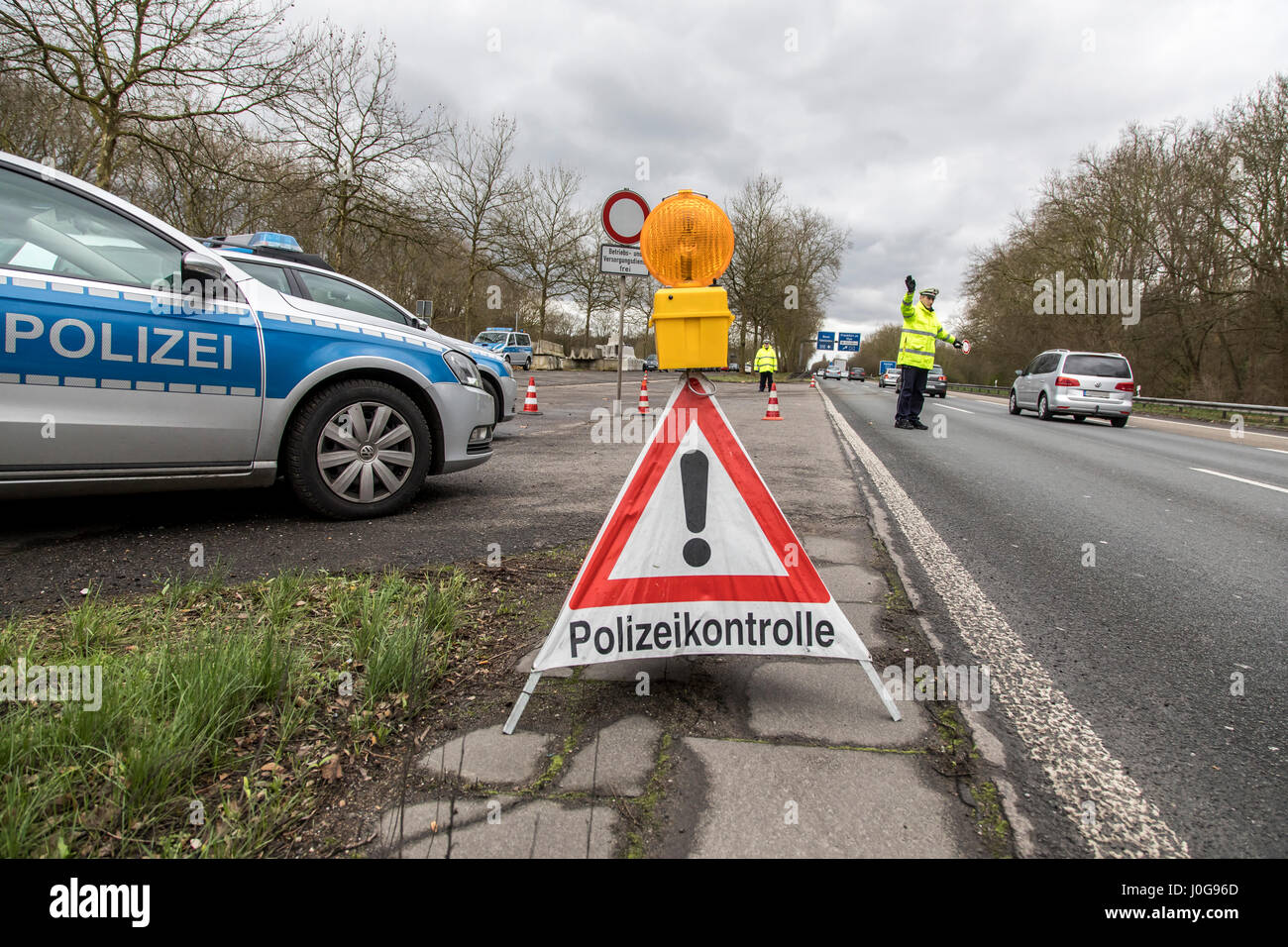 Police control of trucks, on the Autobahn A555 in Cologne, Germany ...
