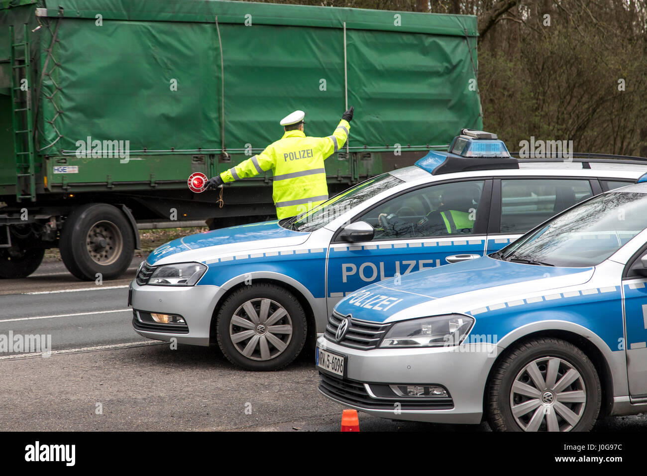 Police control of trucks, on the Autobahn A555 in Cologne, Germany ...