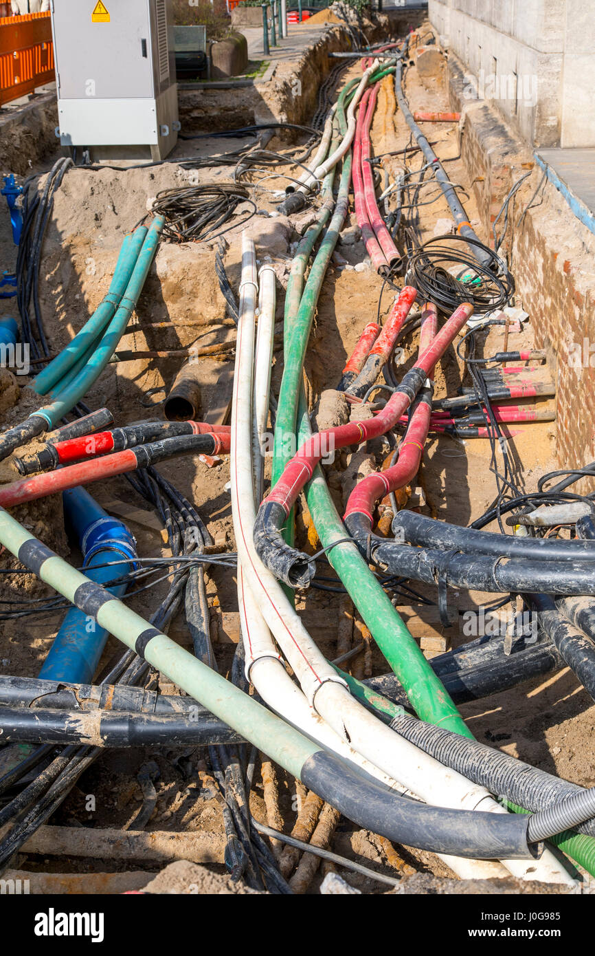 Cables, pipelines, tangle in a construction site, supply lines cleared ...