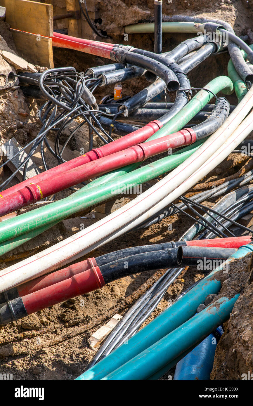 Cables, pipelines, tangle in a construction site, supply lines cleared ...
