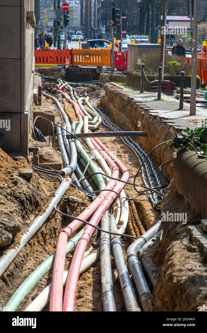 Cables, pipelines, tangle in a construction site, supply lines cleared ...