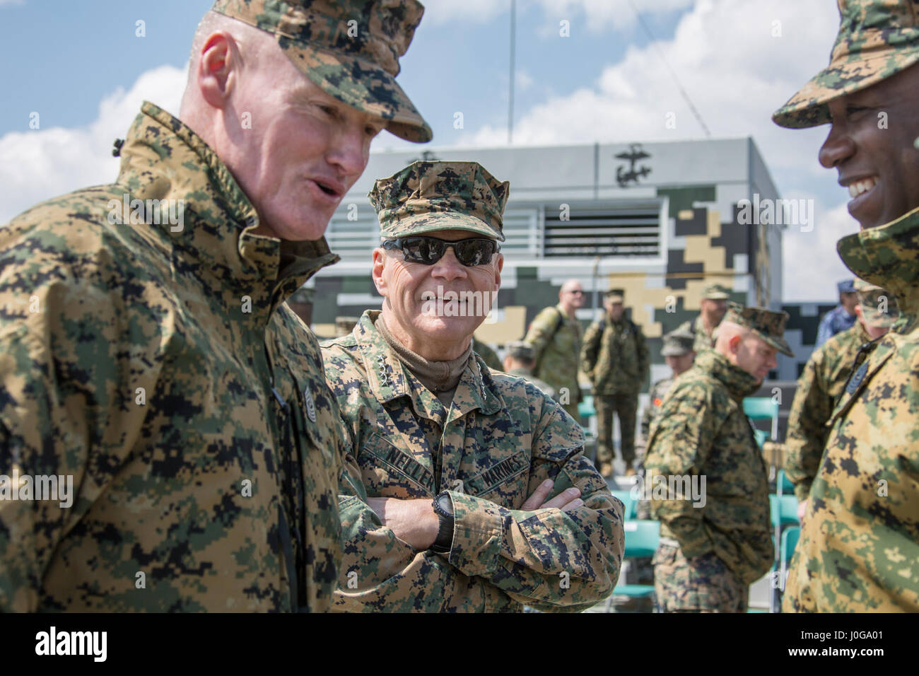 Commandant of the Marine Corps Gen. Robert B. Neller, center, speaks ...