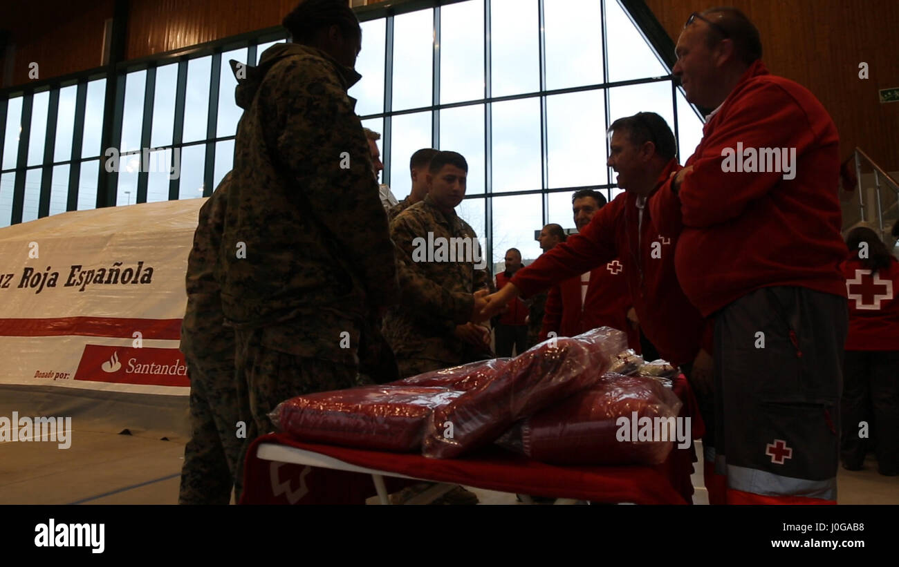 Spanish Red Cross employees show U.S. Marines assigned to Special ...
