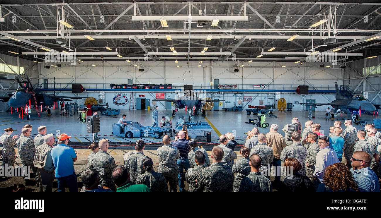 A crowd watches as three teams compete in the Team Eglin weapons load ...