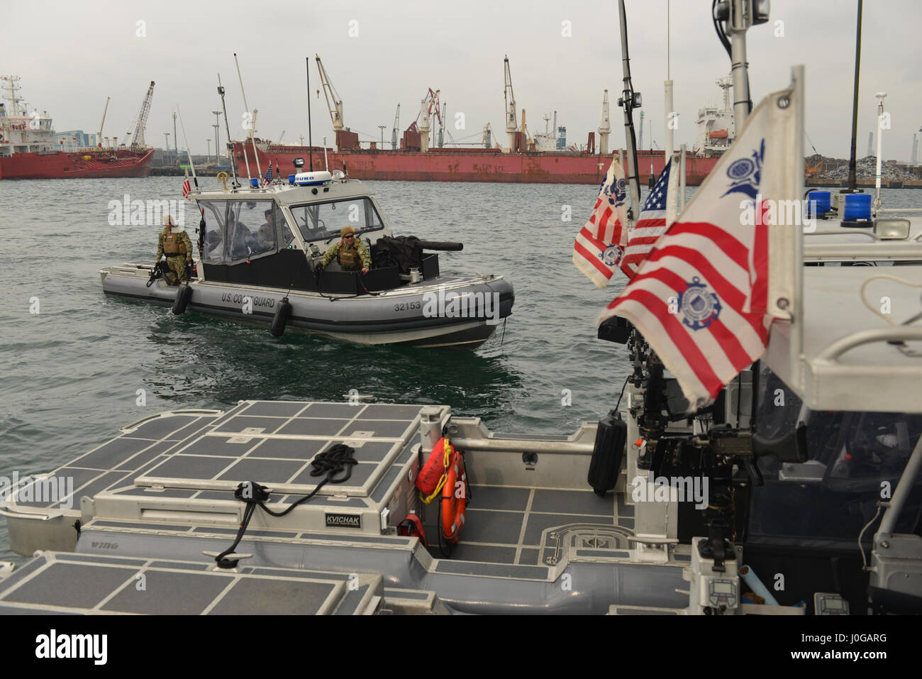 U.S. Coast Guard Port Security Unit 312 members moor up thier 32-foot ...