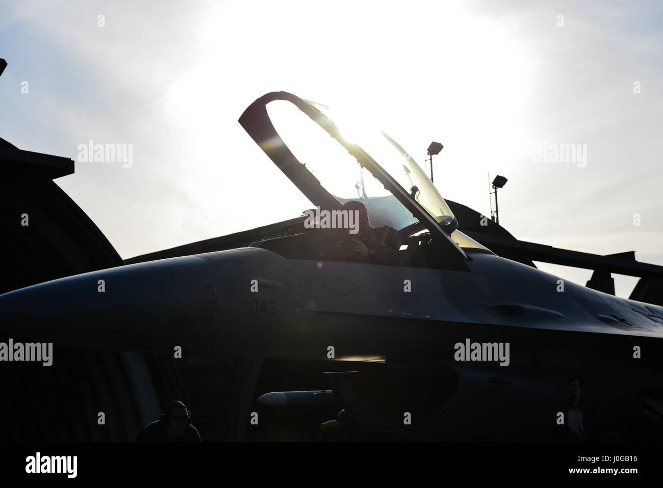 A 36th Fighter Squadron pilot prepares to disembark his F-16 Fighting ...