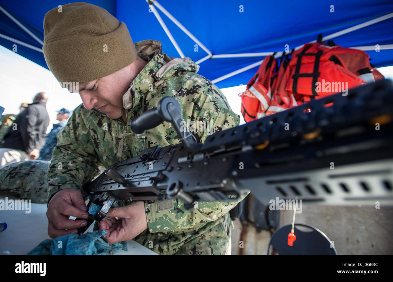 U.S. Coast Guard Maritime Enforcement 2nd Class Lino Ramirez assigned ...